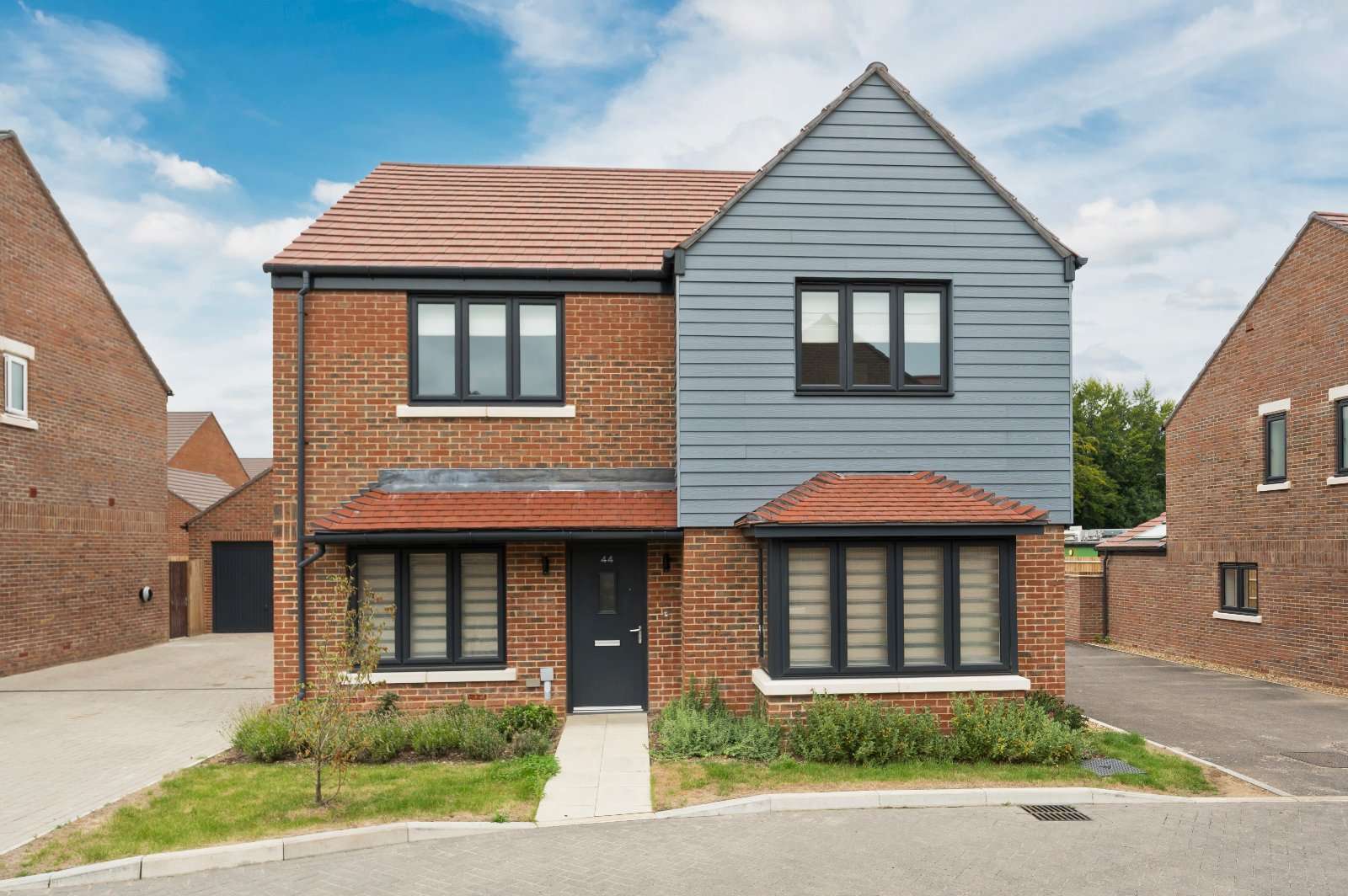 Four bedroom houses for sale in Row Town, Surrey | Savills